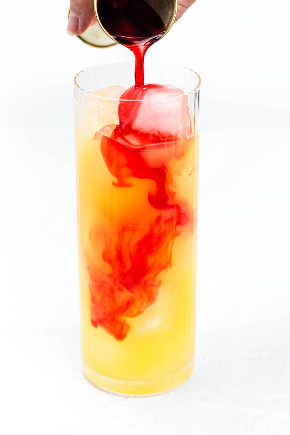 Sunrise Mocktail (Non-Alcoholic Tequila Sunrise) | Feast + West